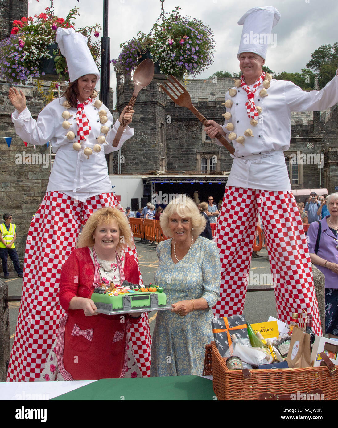The Duchess of Cornwall is given a birthday cake by Dottie King to ...