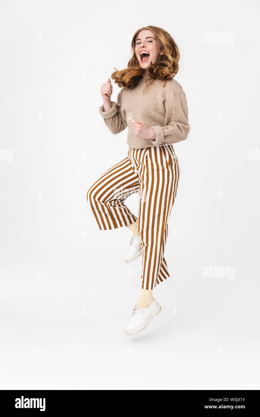 Image of a surprised screaming excited cute young teenage girl posing ...