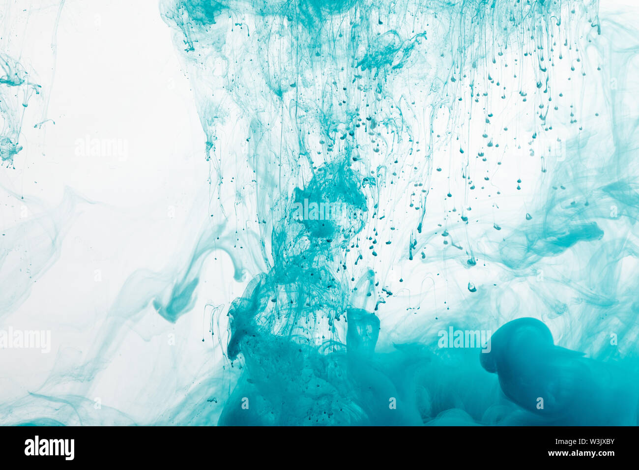 Close up view of blue paint splash in water Stock Photo - Alamy