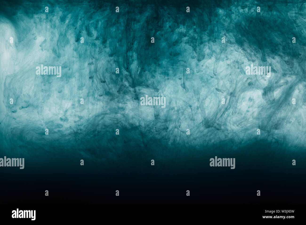 dark artistic blue paint swirls in water Stock Photo - Alamy