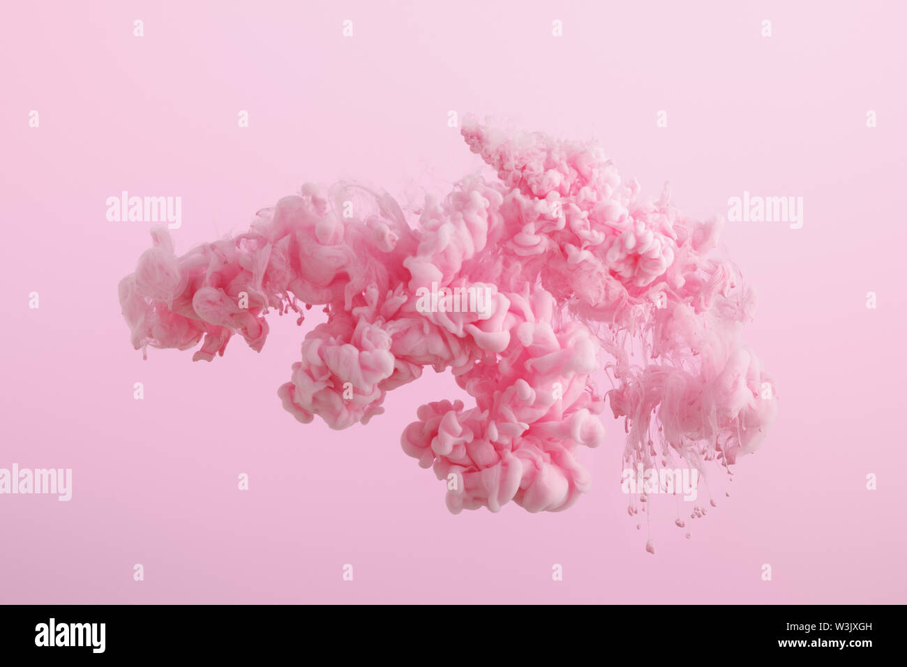 pink paint splash in water isolated on pink Stock Photo - Alamy