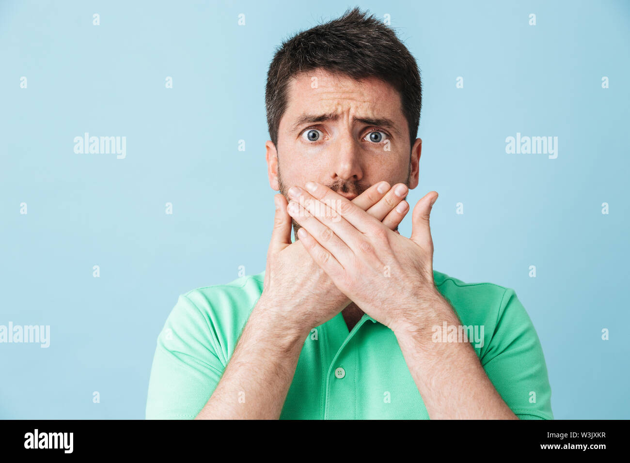 Image of scared confused young handsome bearded man posing isolated ...