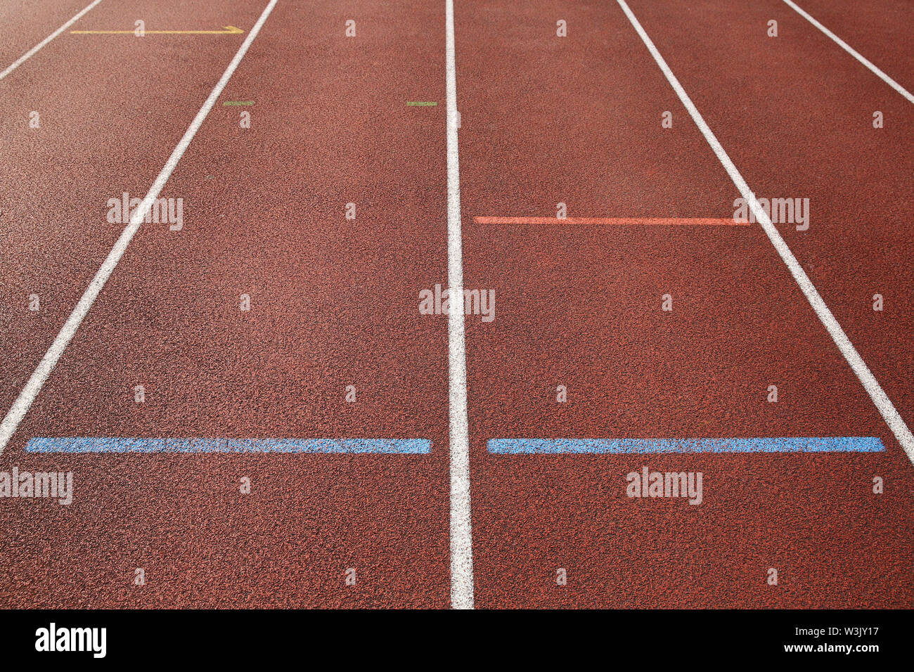 Finish lines - on the running track Stock Photo - Alamy