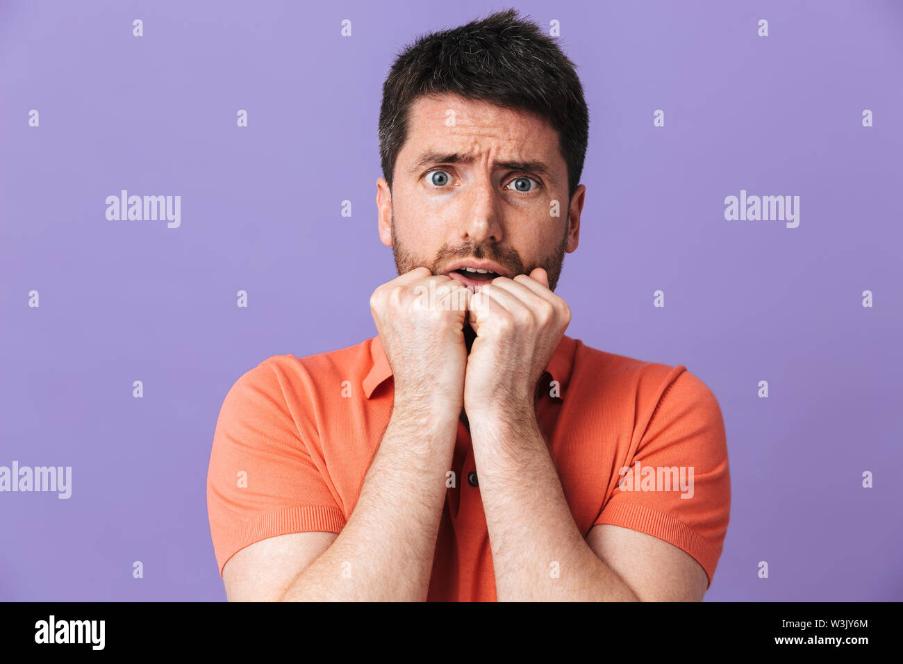 Image of confused scared shocked emotional young handsome bearded man ...