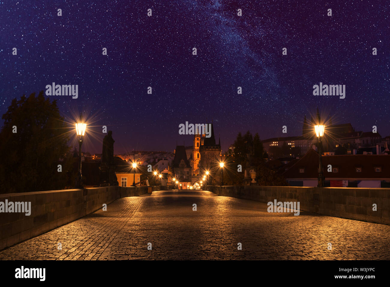 Prague, Charles bridge at night with starry sky Stock Photo - Alamy
