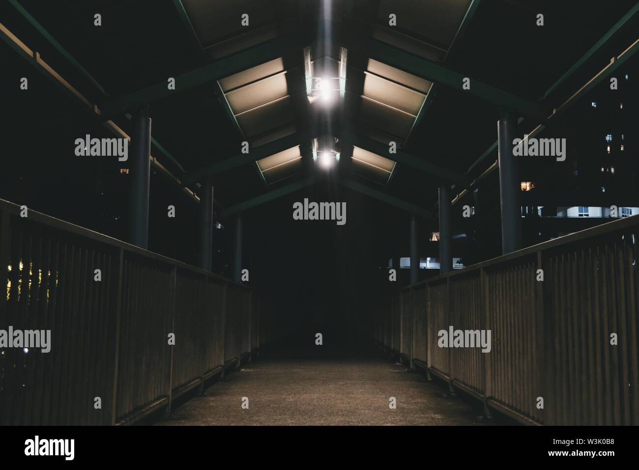 Interior of an empty horse barn with cages shot in low exposure Stock ...