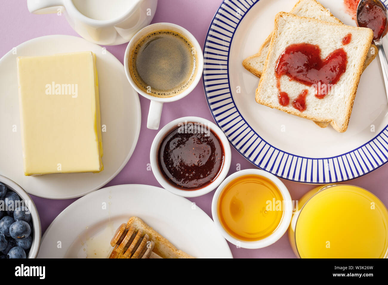top view of table setting foe breakfast on violet background Stock ...
