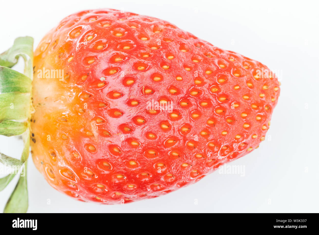 close up view of fresh whole ripe red strawberry on white background ...