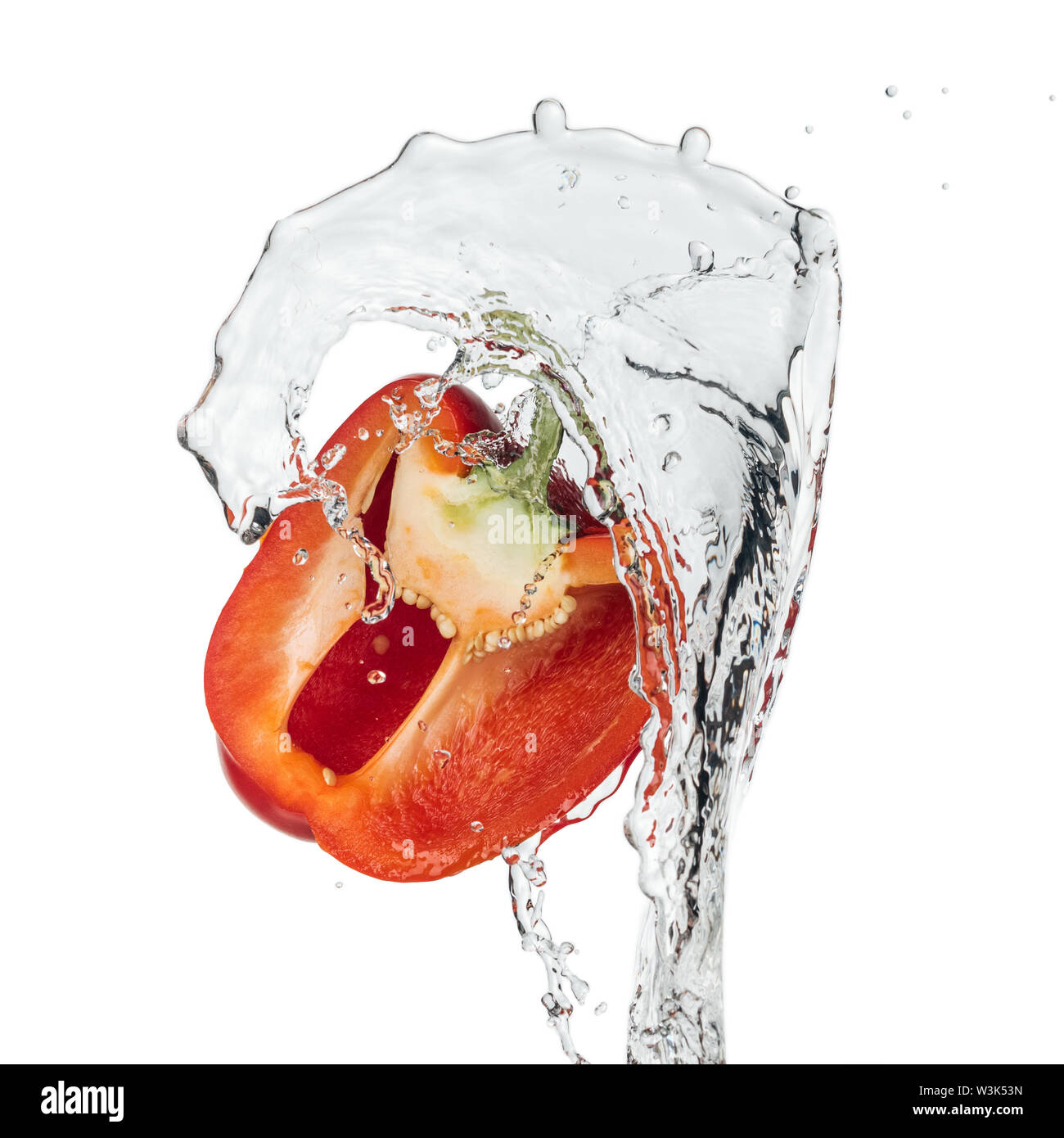red bell pepper half with clear water isolated on white Stock Photo - Alamy