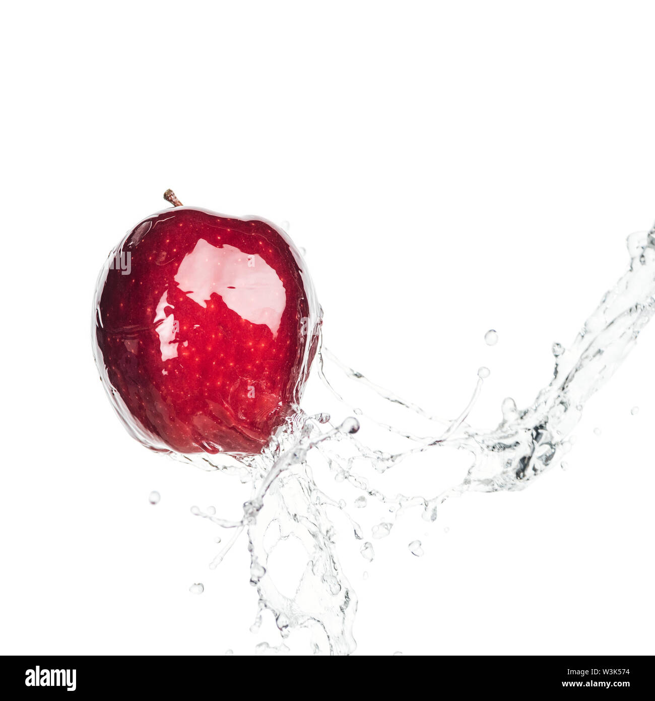 whole wet ripe red apple and clear water splash isolated on white Stock ...