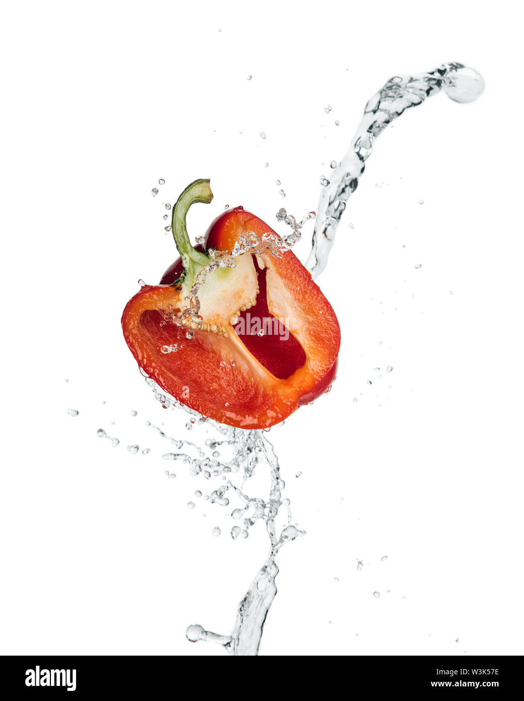 red bell pepper half with clear water splash and drops isolated on ...