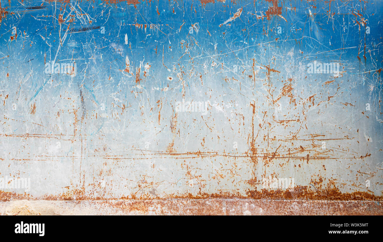 Scratched rusty metal wall texture Stock Photo - Alamy