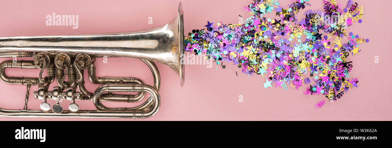 Confetti trumpet hi-res stock photography and images - Alamy