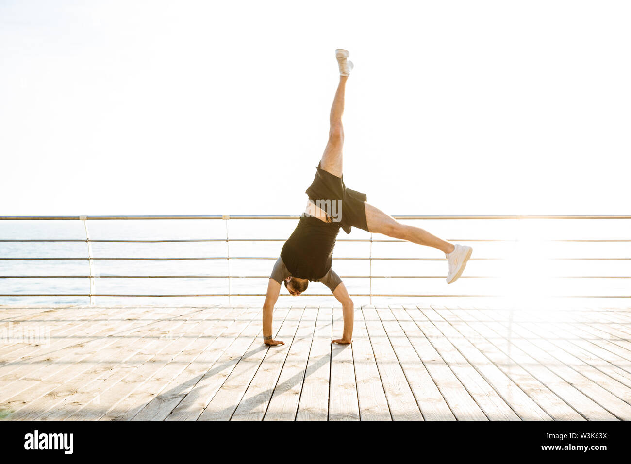 Cartwheel on the beach hi-res stock photography and images - Alamy
