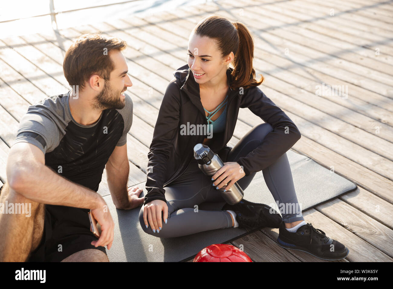 Runner talking to coach hi-res stock photography and images - Alamy