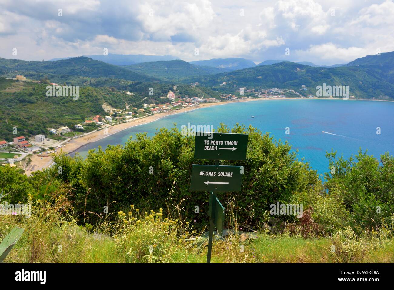 Tourist directional signs,Porto Timoni beach,Afionas Square,with Agios ...