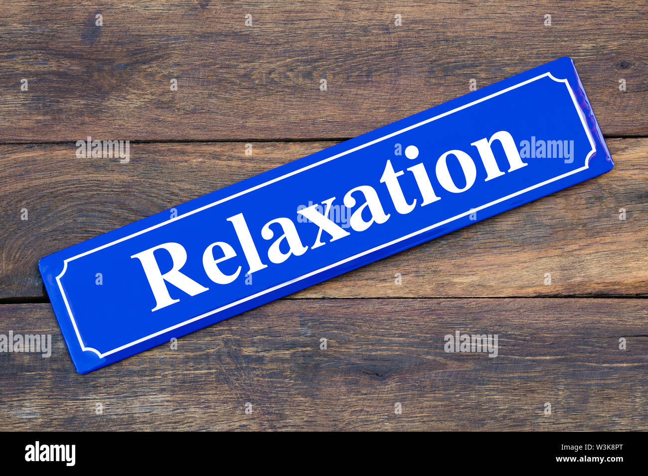 Relaxation street sign on wooden background as symbol for work life ...