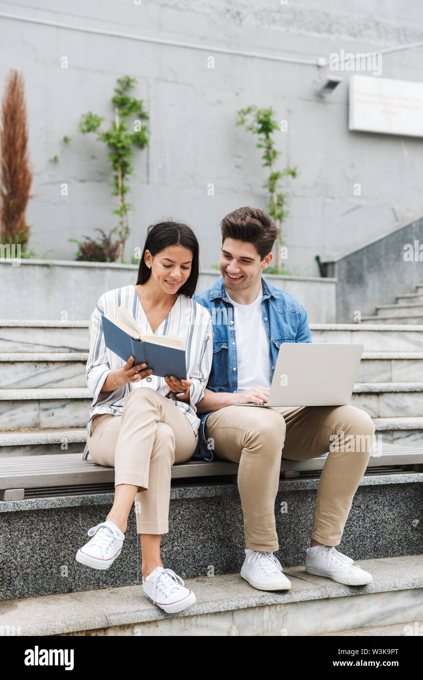 Photo of young amazing loving couple business people colleagues ...
