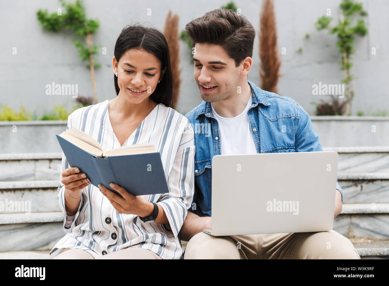 Photo of young amazing loving couple business people colleagues ...