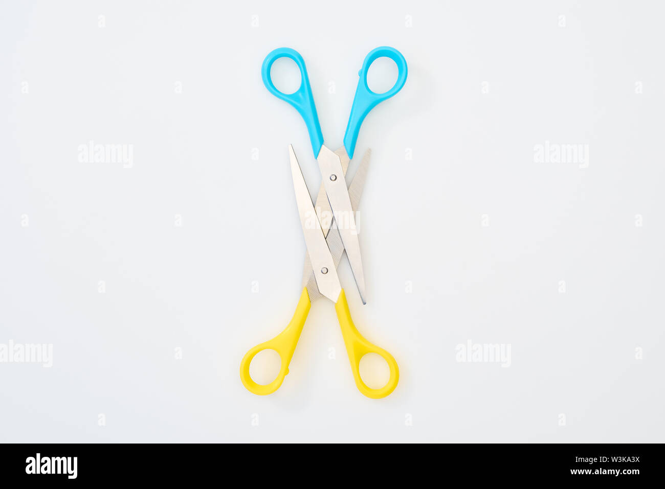top view of colourful scissors isolated on white Stock Photo - Alamy