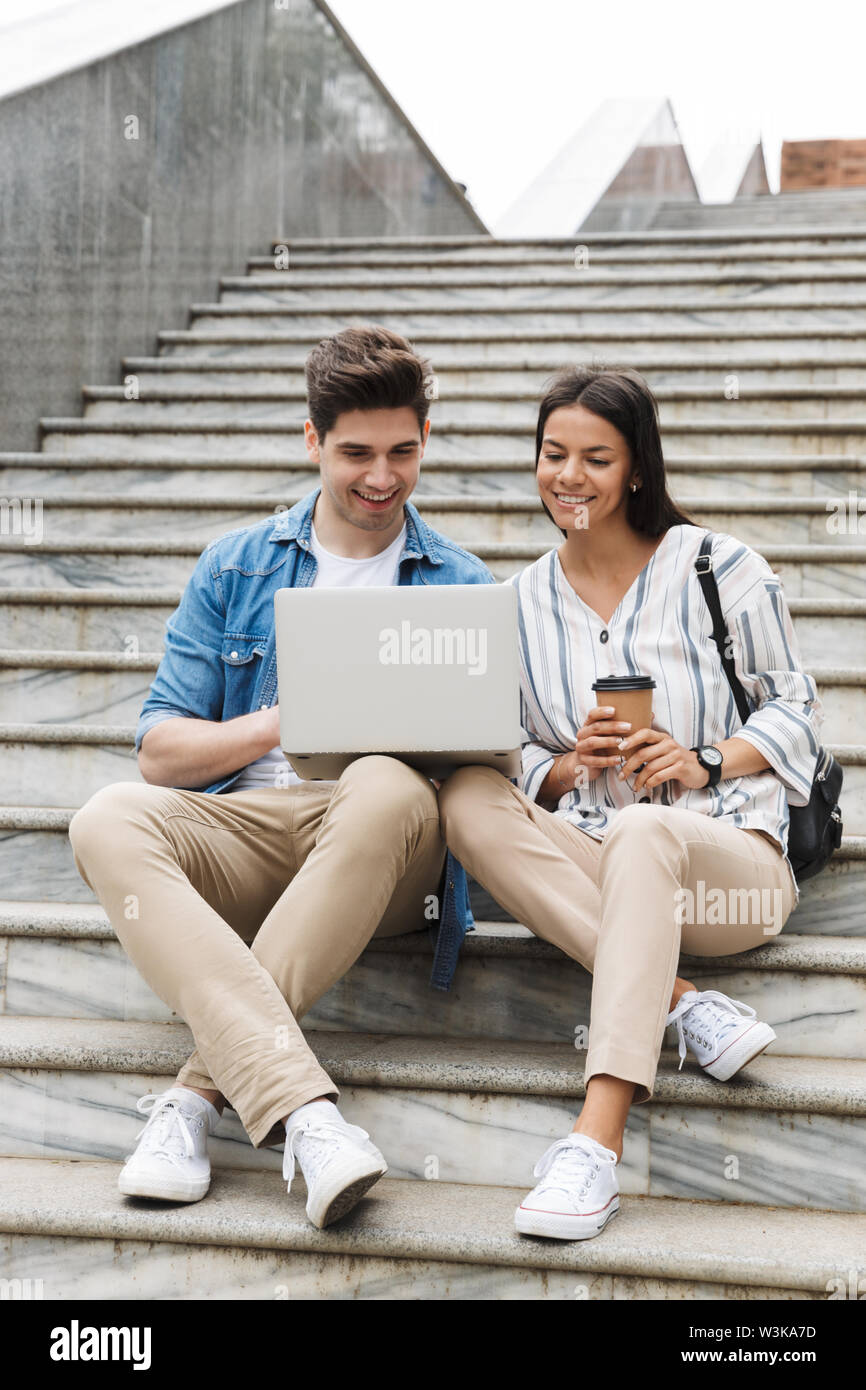 Image of happy cheerful young amazing loving couple business people ...