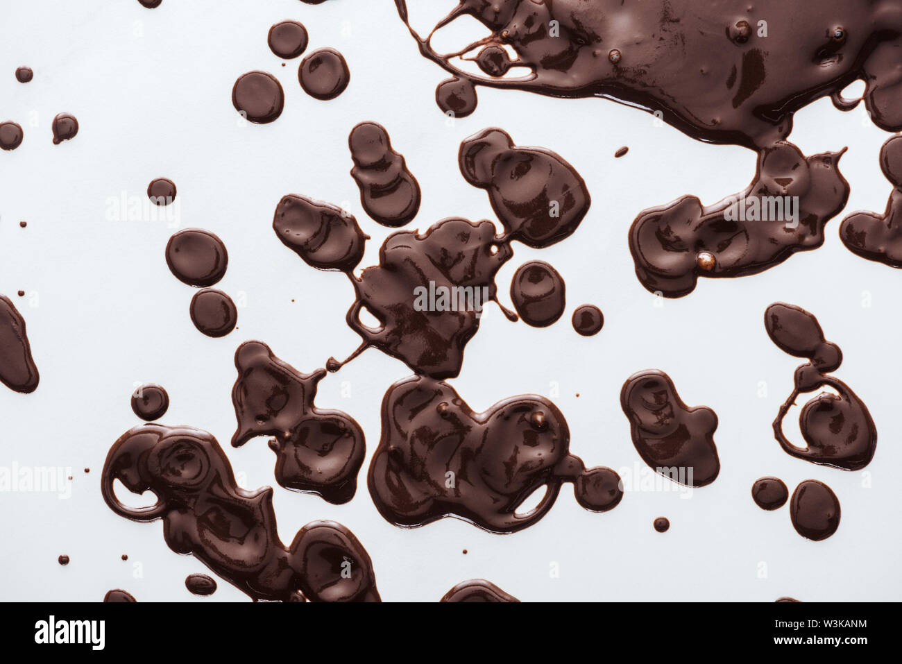 Top view of drops of liquid dark chocolate, abstract background Stock ...