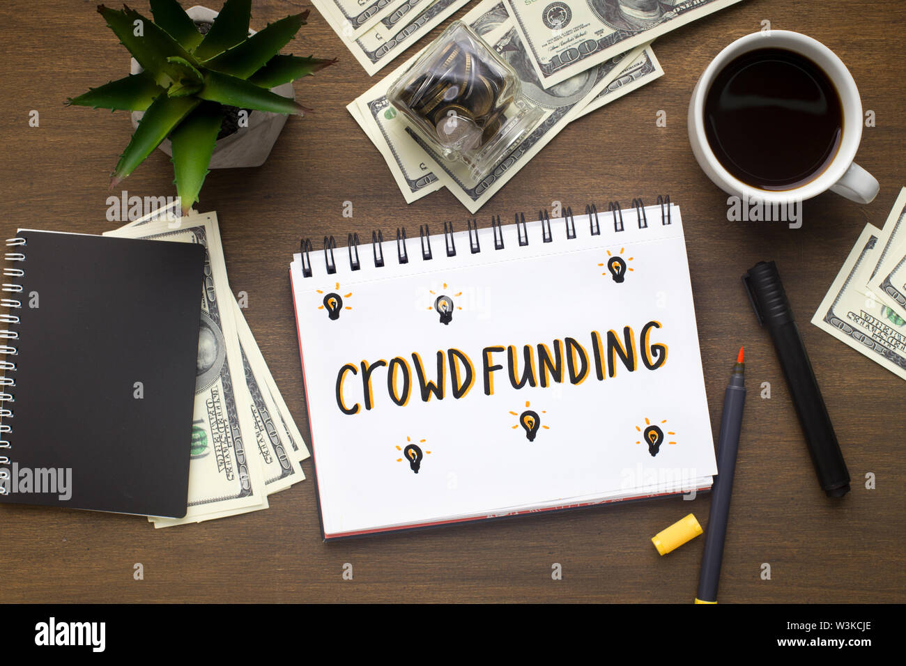 Distribution of money on crowdfunding, flat lay on office table Stock ...