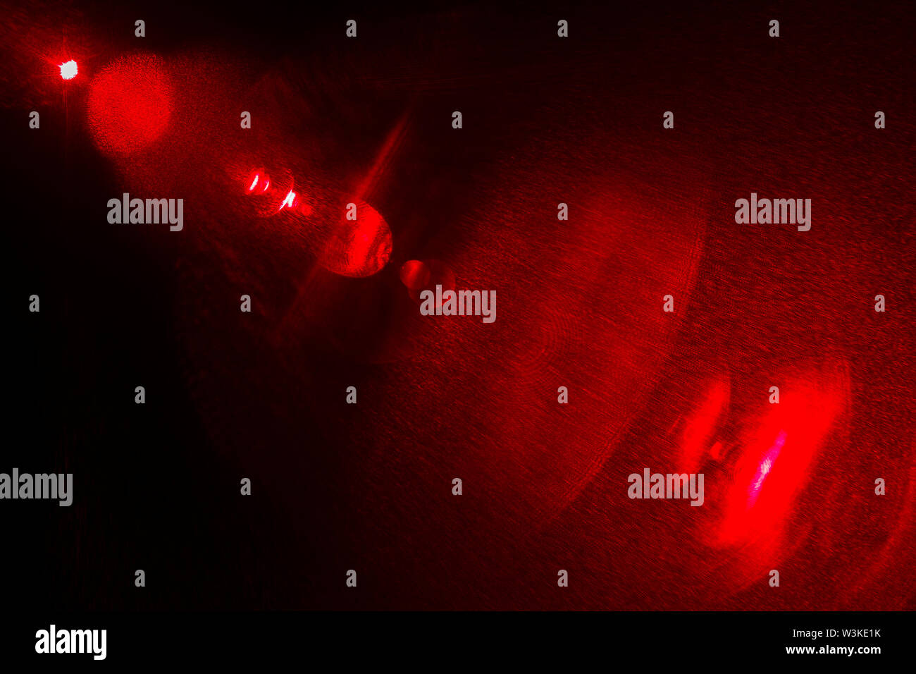 Název Camera lens flare by laser light create circles of objective iris ...