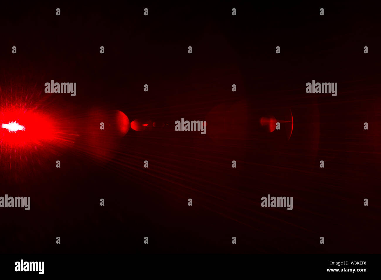 Camera lens flare by laser light create hexagons of objective iris ...