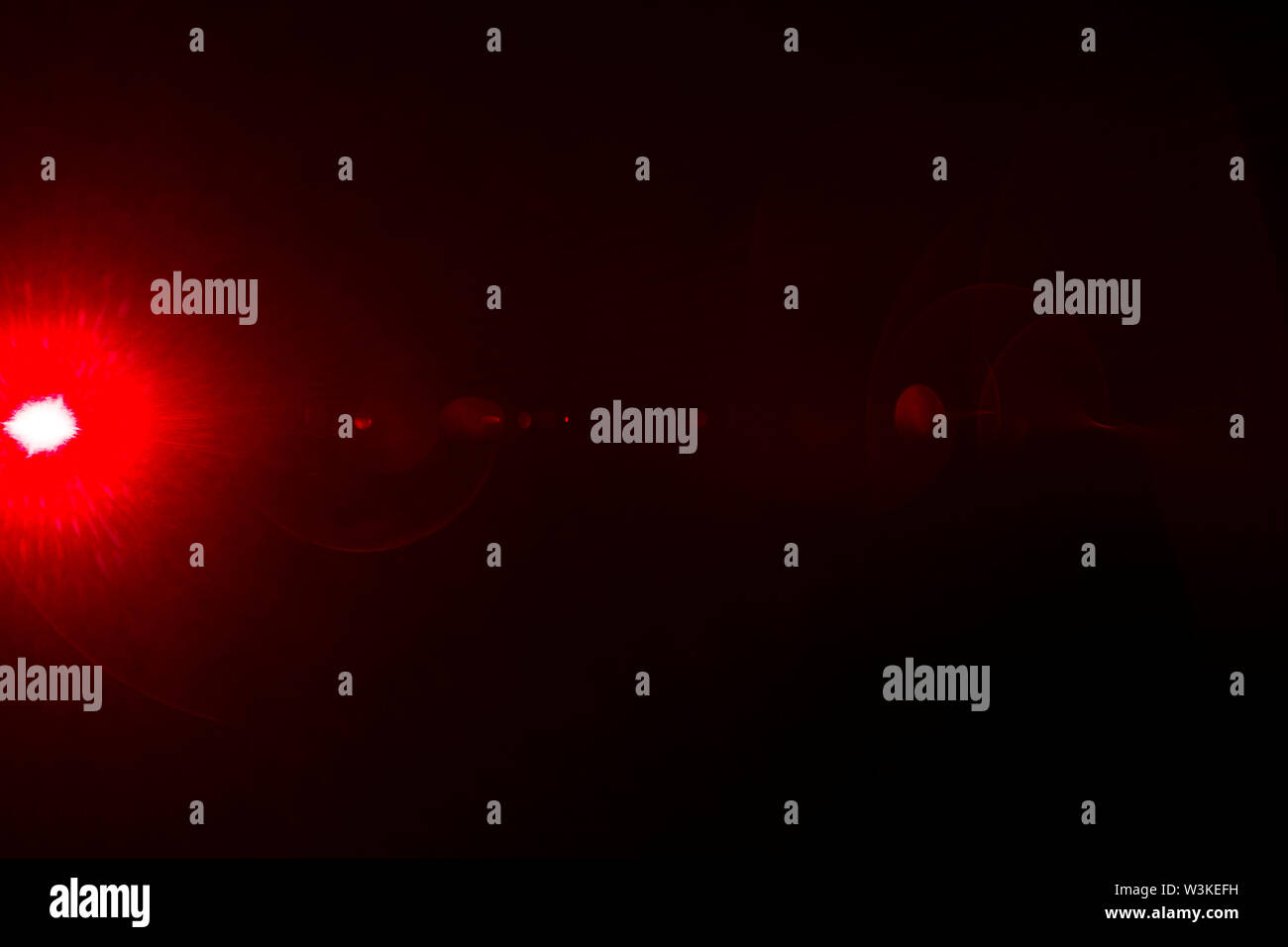 Camera lens flare by laser light create hexagons of objective iris ...