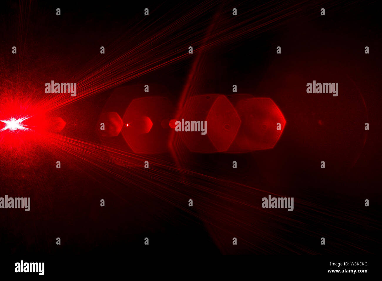 Camera lens flare by laser light create hexagons of objective iris ...