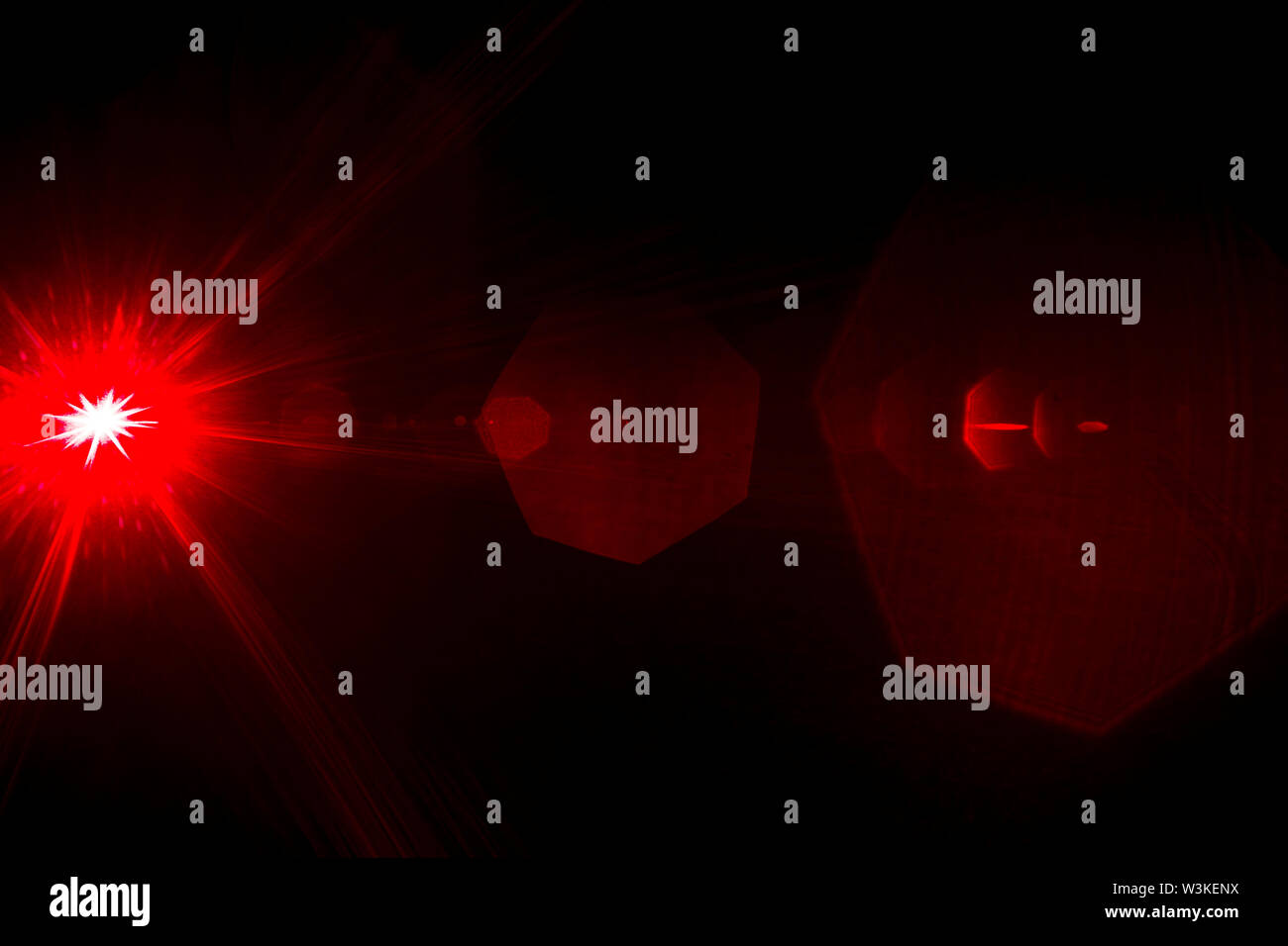 Camera lens flare by laser light create hexagons of objective iris ...