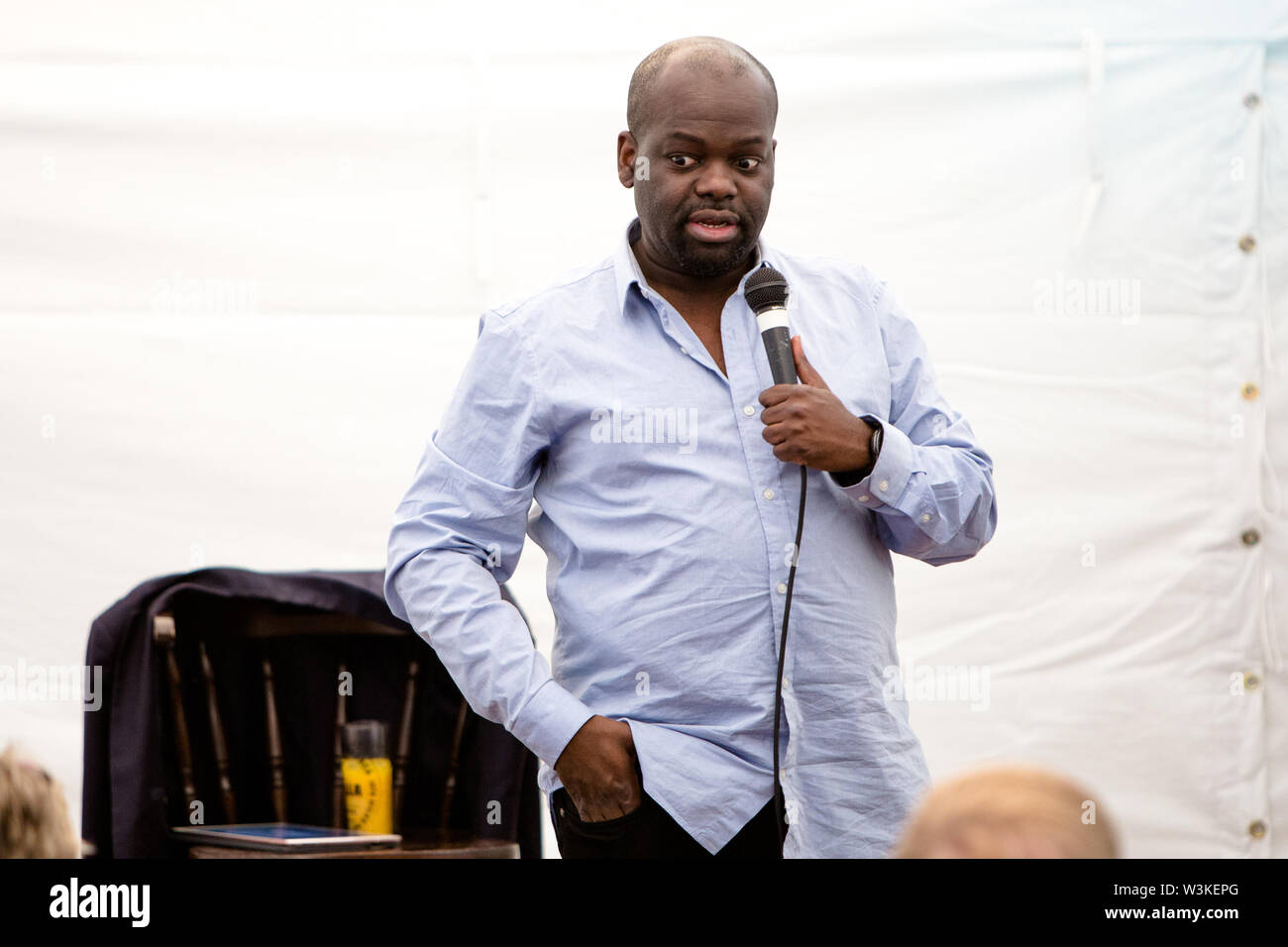Northampton, UK. 14th July, 2019. Comedian Daliso Chaponda performs his ...
