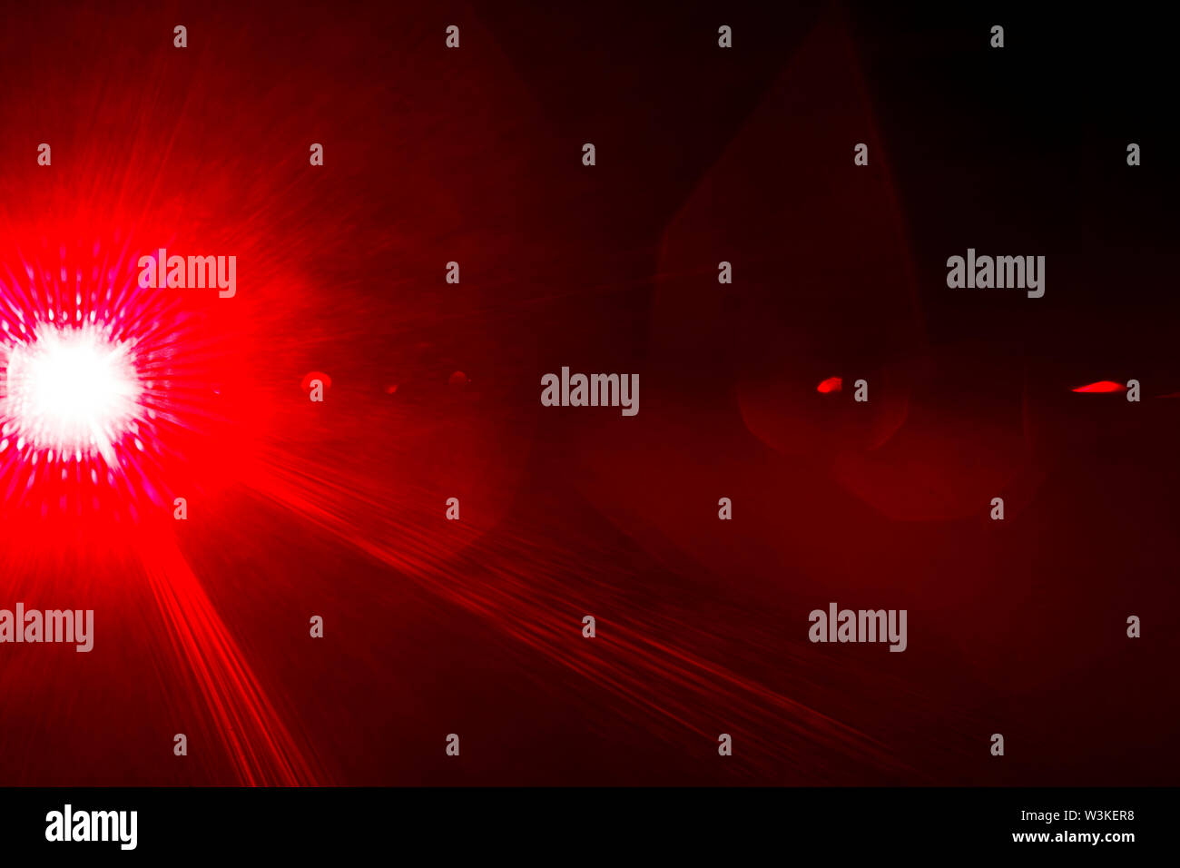 Camera lens flare by laser light create hexagons of objective iris ...