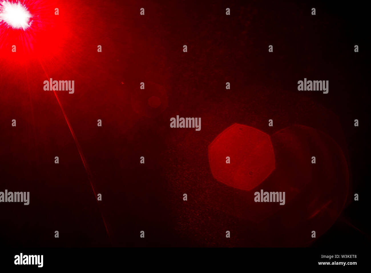 Camera lens flare by laser light create hexagons of objective iris ...