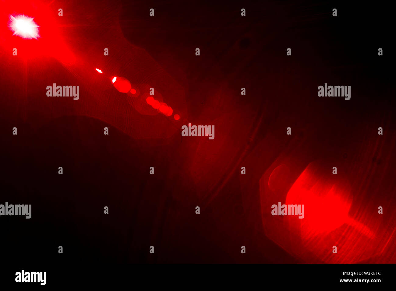 Camera lens flare by laser light create hexagons of objective iris ...