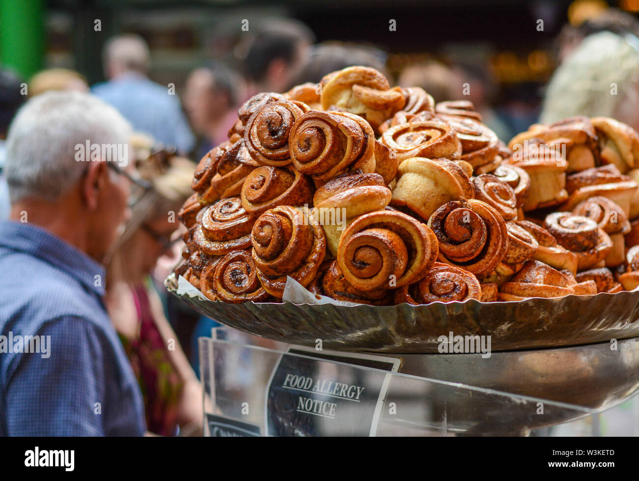 Variety of pastry. Cinnamon rolls on display at the Borough Market ...