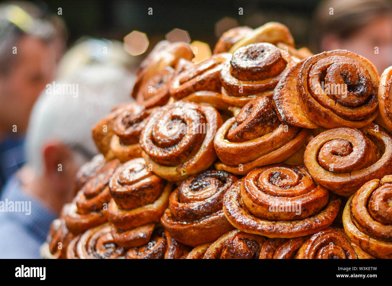 Variety of pastry. Cinnamon rolls on display at the Borough Market ...