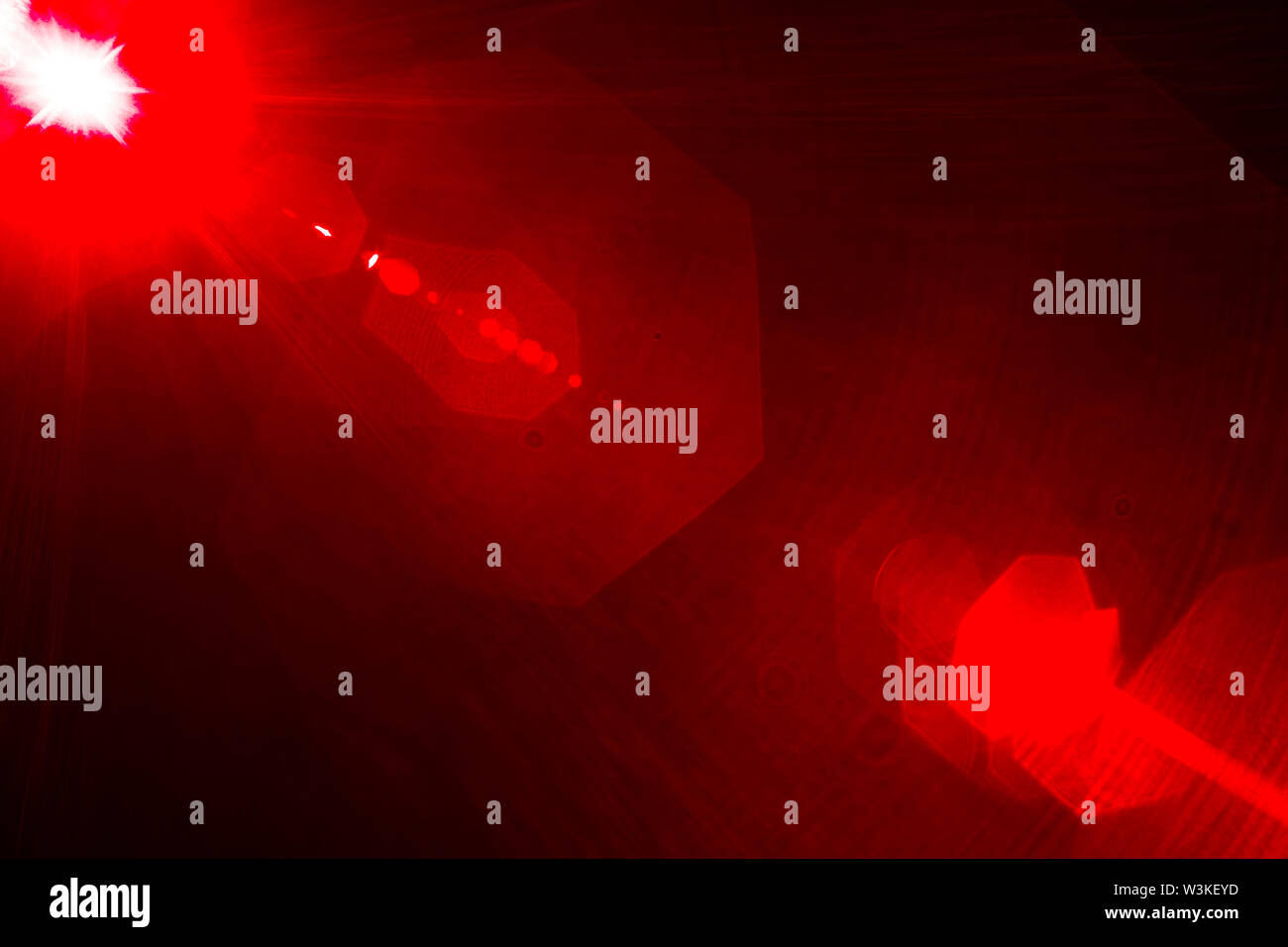 Camera lens flare by laser light create hexagons of objective iris ...