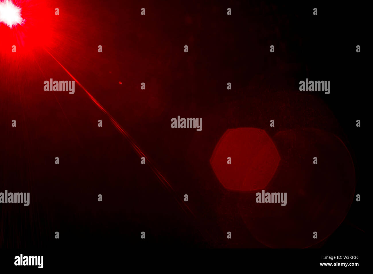 Camera lens flare by laser light create hexagons of objective iris ...