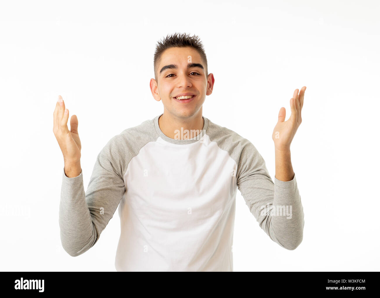 Portrait of young man celebrating achieving his goal, wining the ...