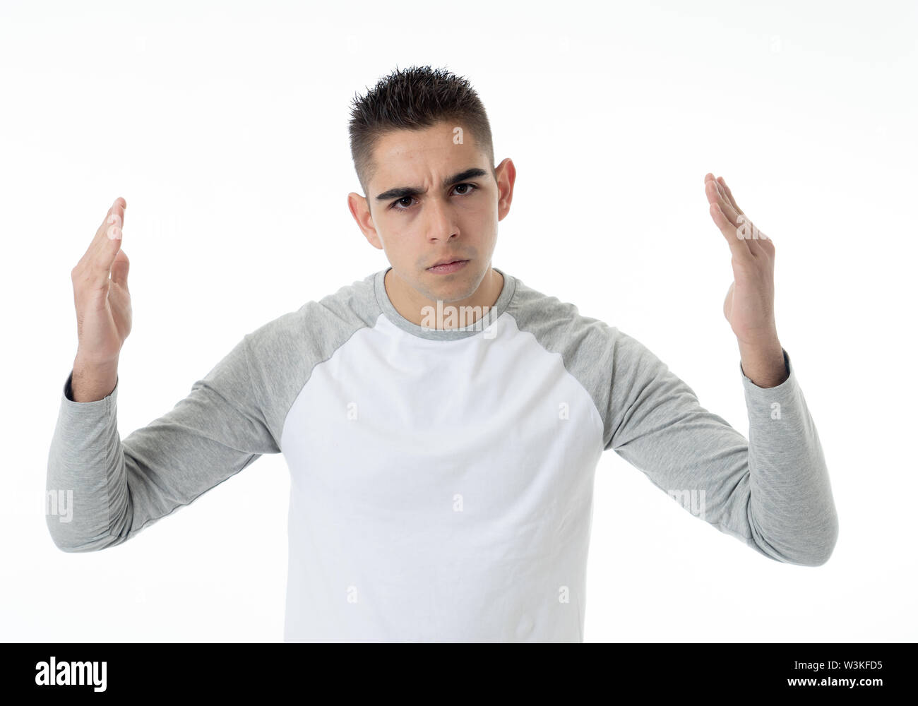 Portrait of angry and upset young man looking furious, aggressive and ...