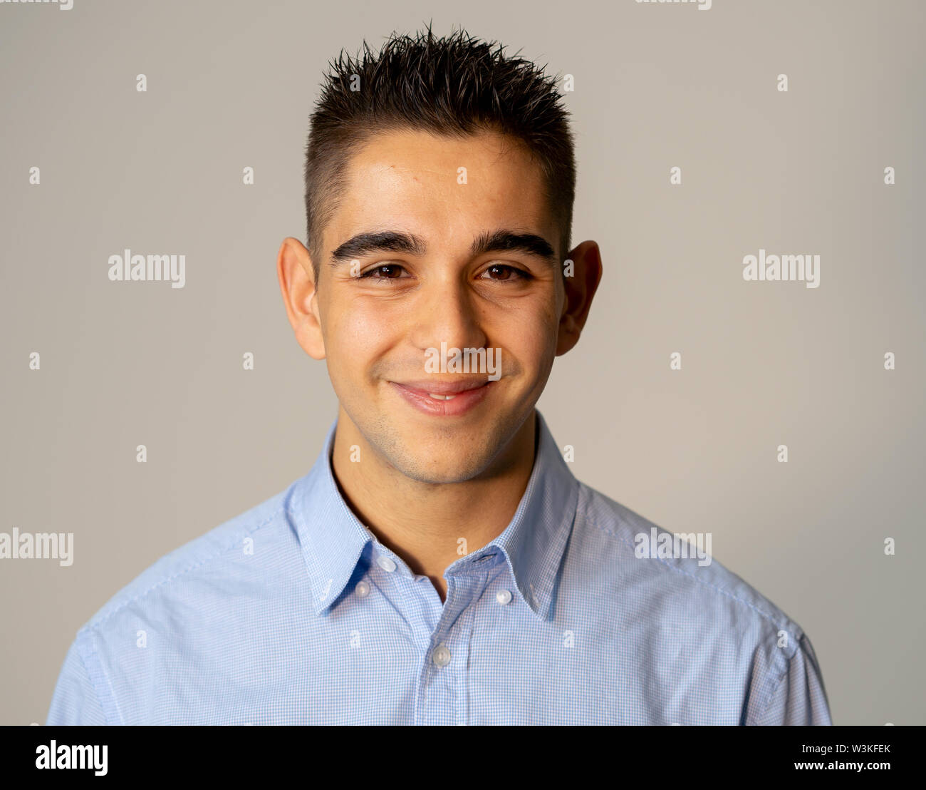Close up portrait of handsome young caucasian male with a happy face ...