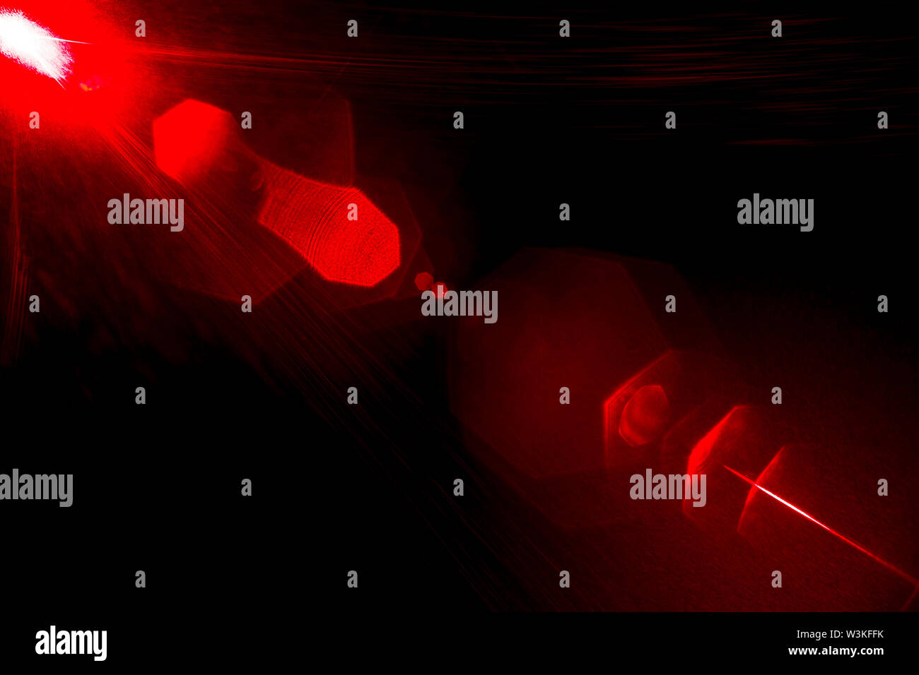 Camera lens flare by laser light create hexagons of objective iris ...