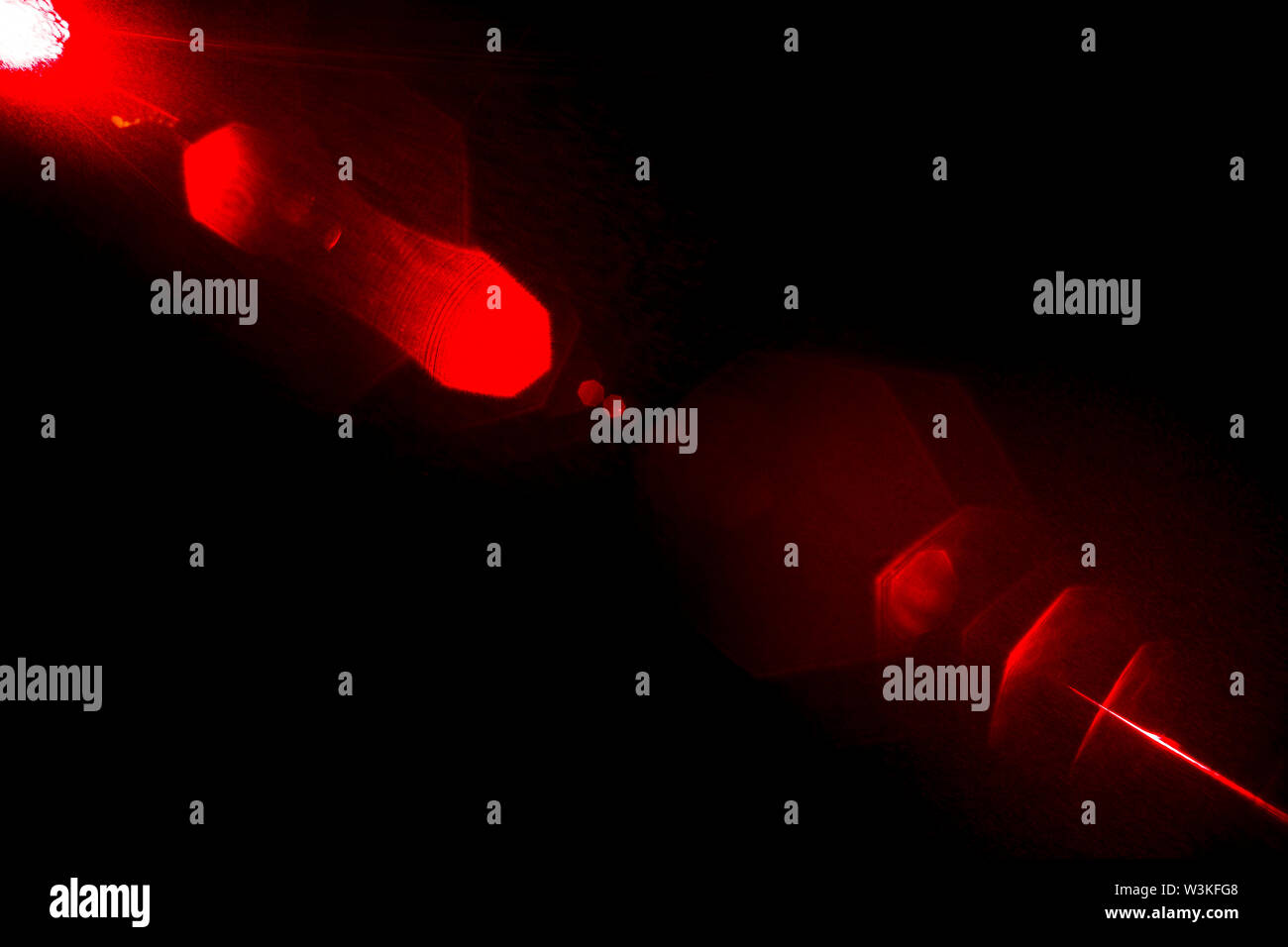 Camera lens flare by laser light create hexagons of objective iris ...