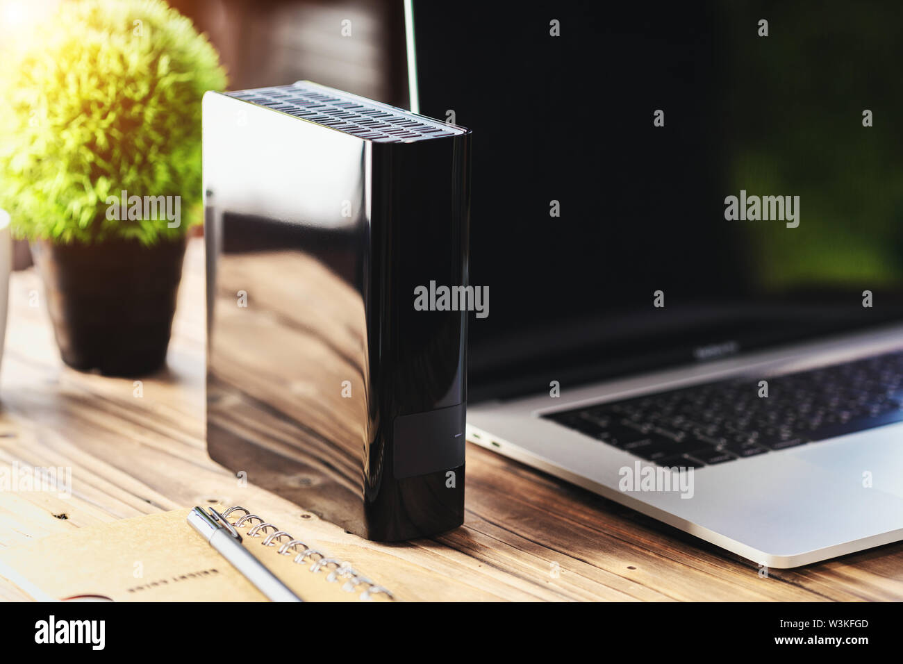 external hard drive on desk Stock Photo - Alamy