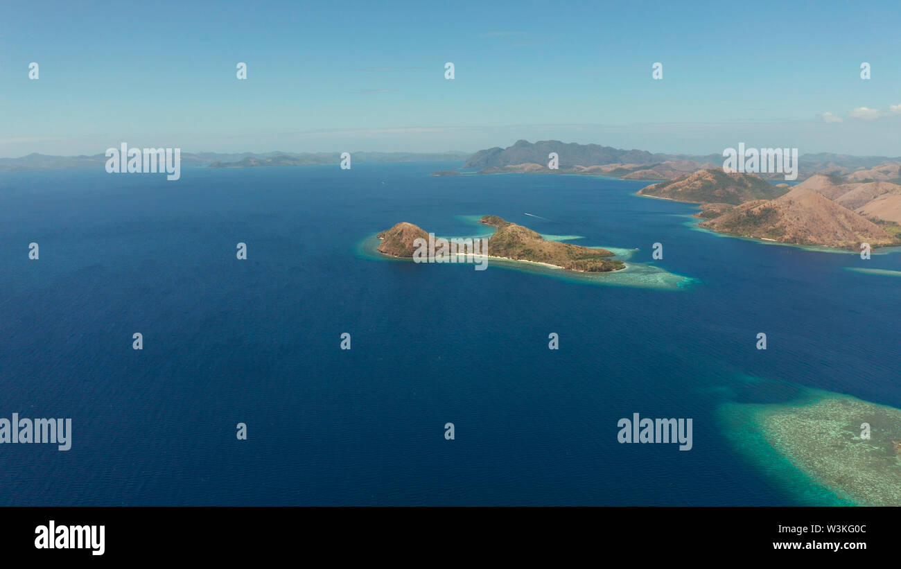 aerial tropical landscape islands with blue lagoons, coral reef and ...