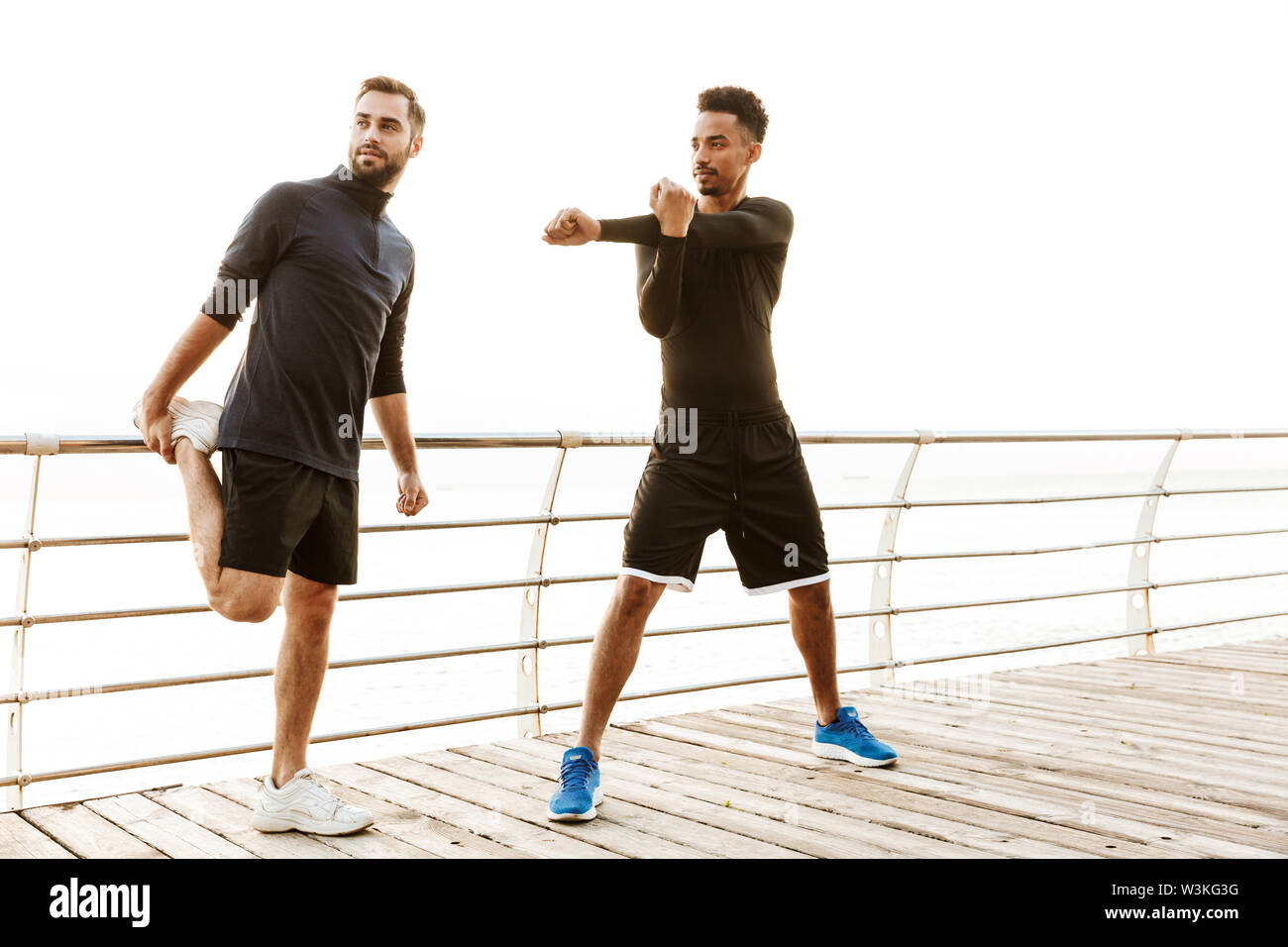 Two handsome caucasian sportsmen hi-res stock photography and images ...