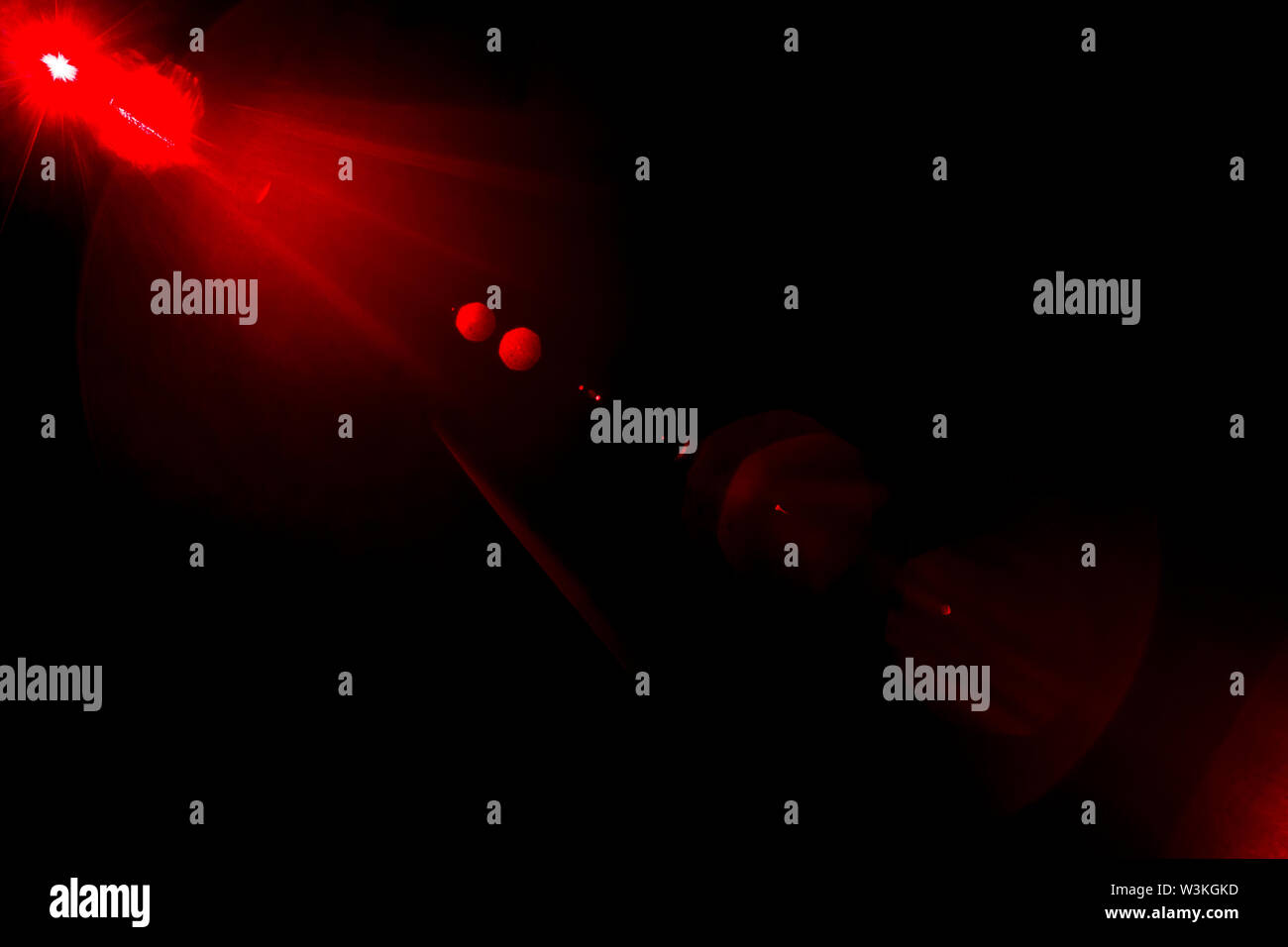 Camera lens flare by laser light create hexagons of objective iris ...