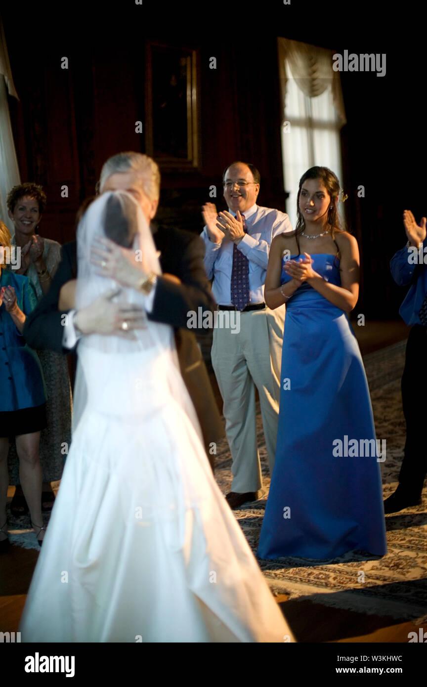 Guests clapping during a wedding reception Stock Photo - Alamy